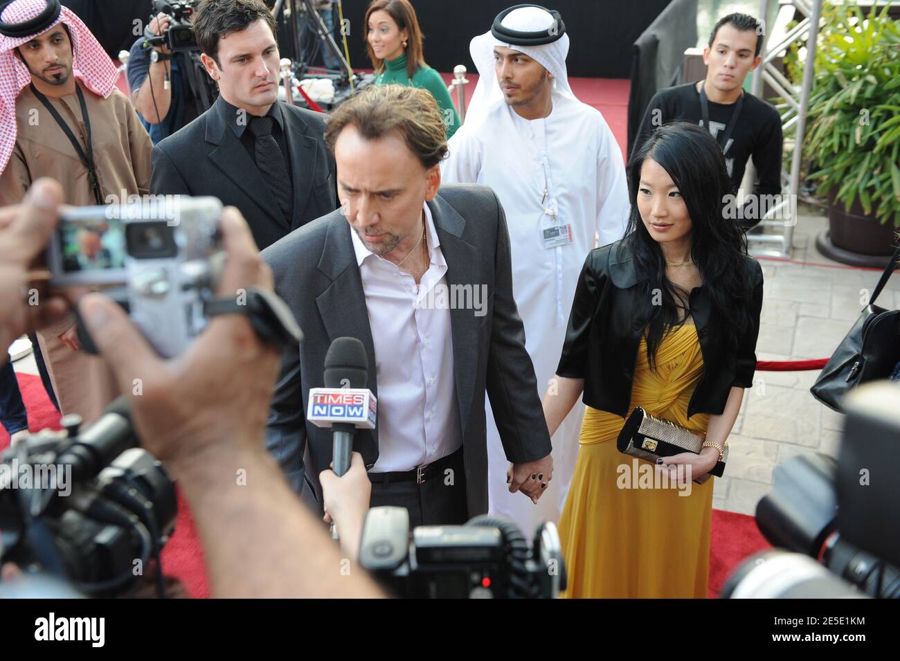 U.S. actor Nicolas Cage and his wife Alice Kim Cage arrive for the ...