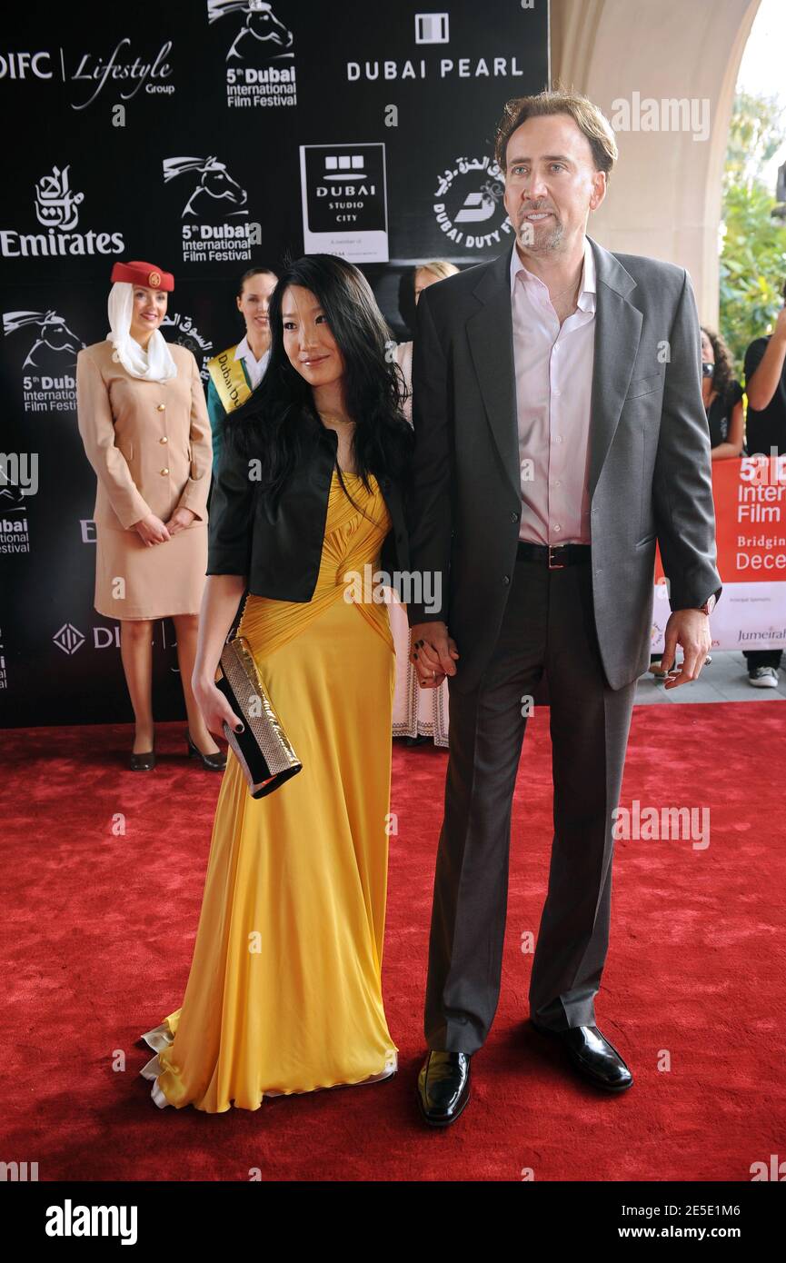 U.S. actor Nicolas Cage and his wife Alice Kim Cage arrive for the ...