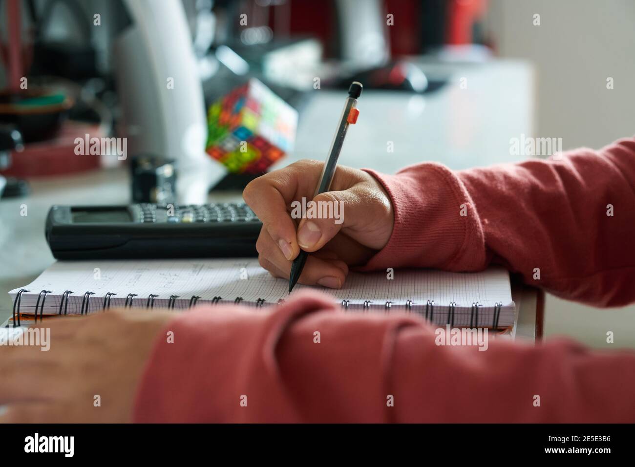 Schoolwork being done at home Stock Photo - Alamy