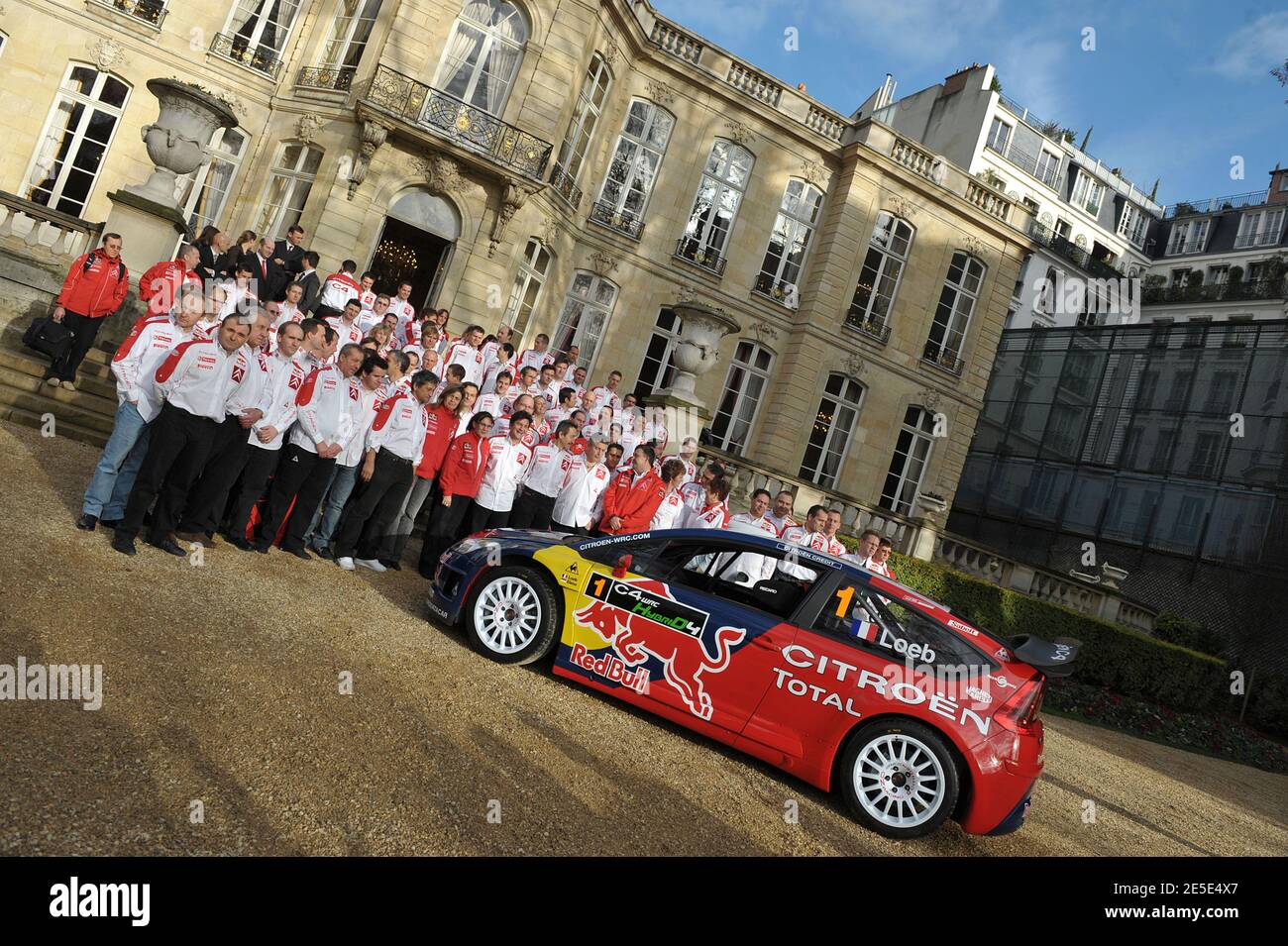 Team Citroen rally auto pose during Citroen C4 WRC HybriD4 auto display ...