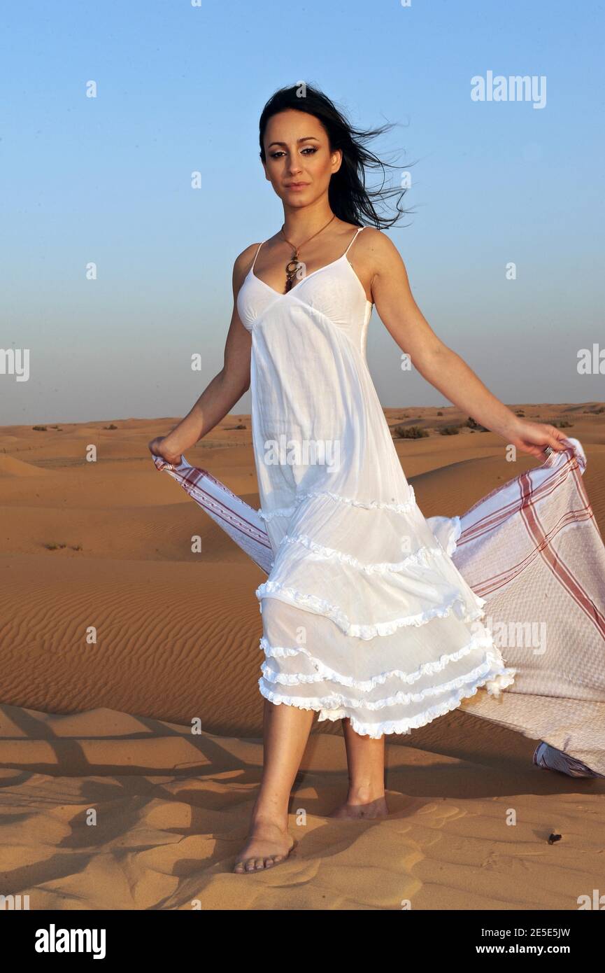 Moroccan actress Sanaa Alaoui poses in the desert near Dubai, United ...