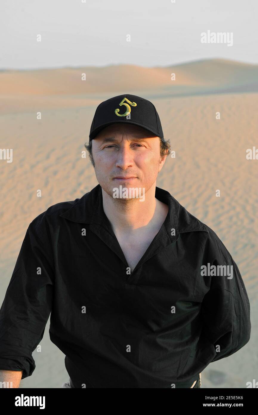 French director Karim Dridi poses in the desert near Dubai, United Arab ...