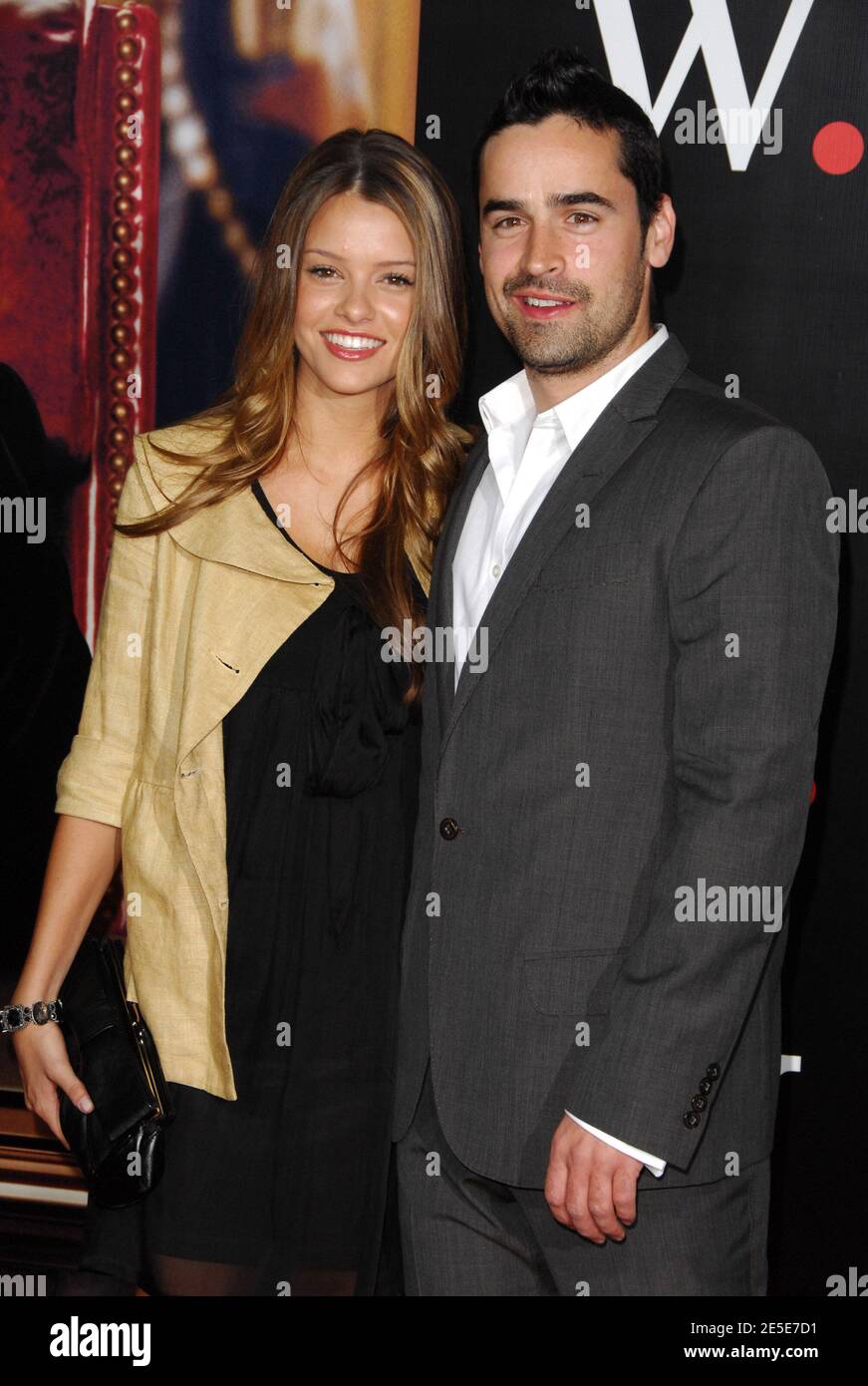 Actor Jesse Bradford (R) and guest attend the premier of 'W' at the ...