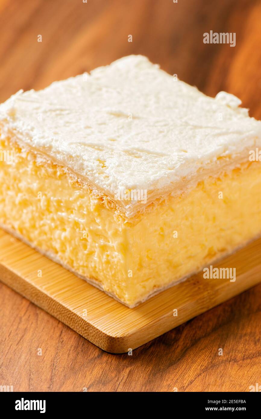 Delectable vanilla slice with custard and buttercream icing Stock Photo ...