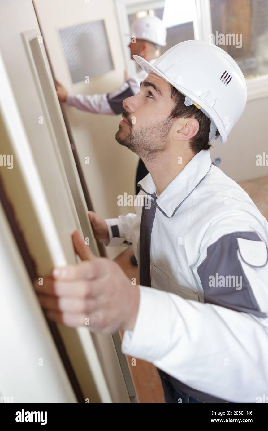 the constructors checking door panel Stock Photo - Alamy