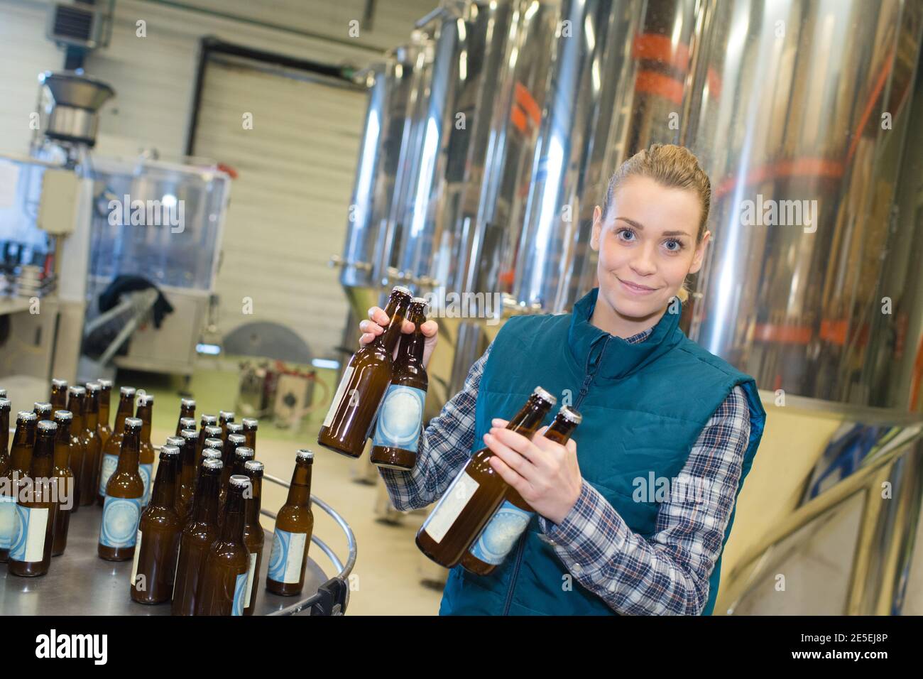 woman and the finished beer products Stock Photo - Alamy