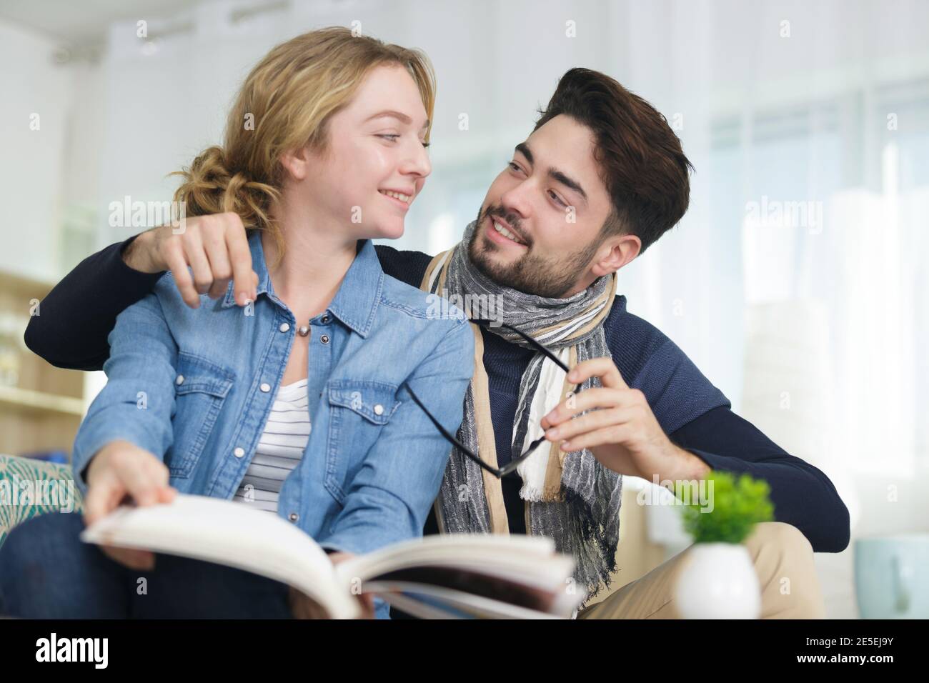 sweet couple doing study Stock Photo - Alamy
