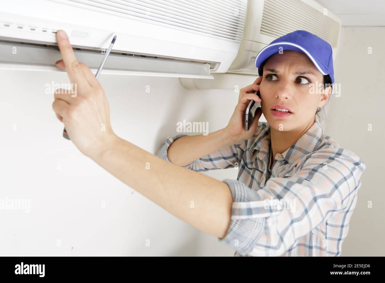 Female Engineer Air Conditioning High Resolution Stock Photography and ...