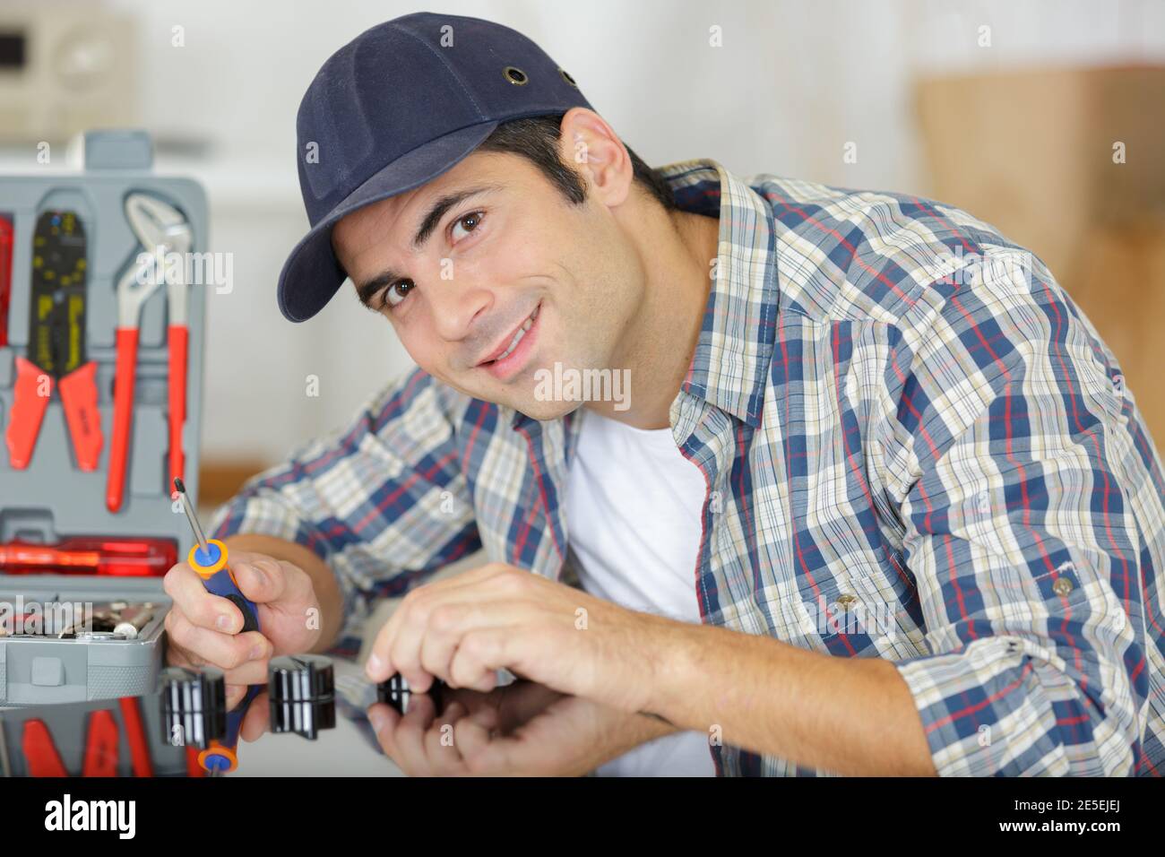 Repairing something hi-res stock photography and images - Alamy