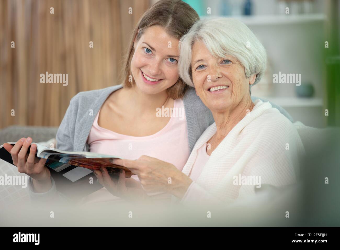 Senior woman daughter magazine hi-res stock photography and images - Alamy