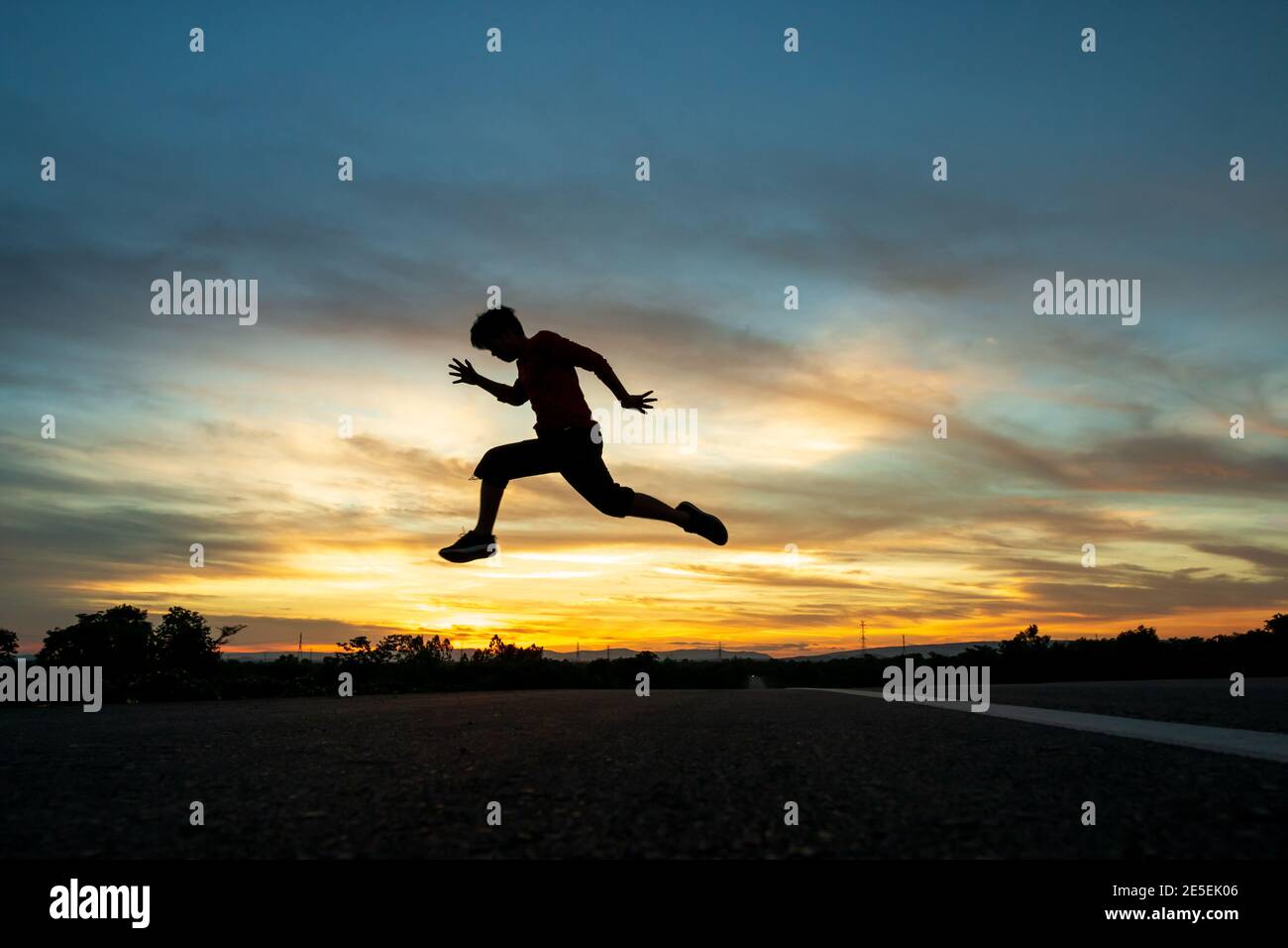Person Jumping Sun Set High Resolution Stock Photography and Images - Alamy