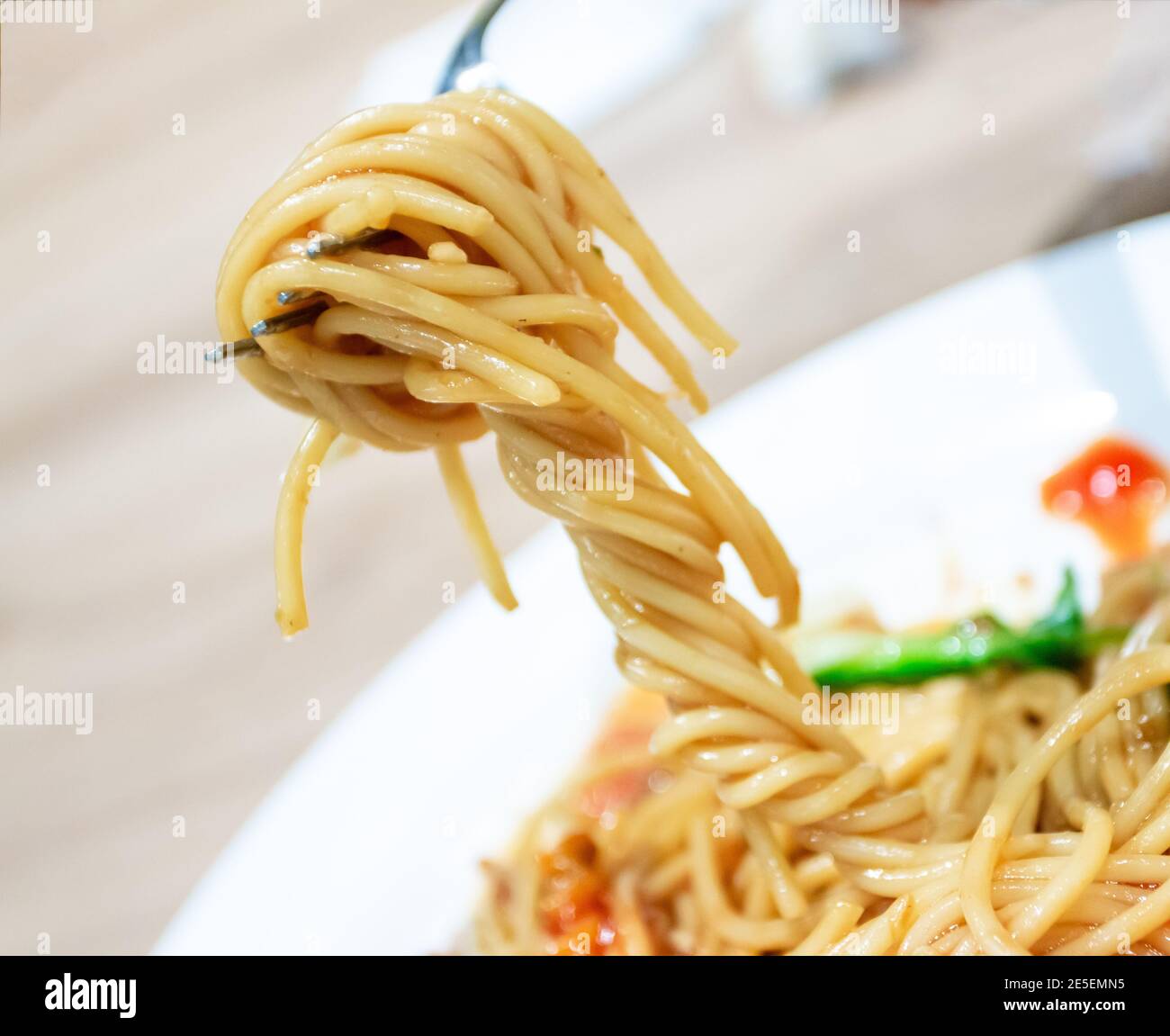 Spaghetti cooked in Thai style, hot and spicy Stock Photo - Alamy
