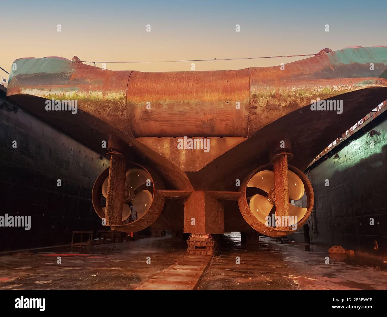 Industry view - Ocean Vessel in the dry dock in shipyard. Old rusty ...
