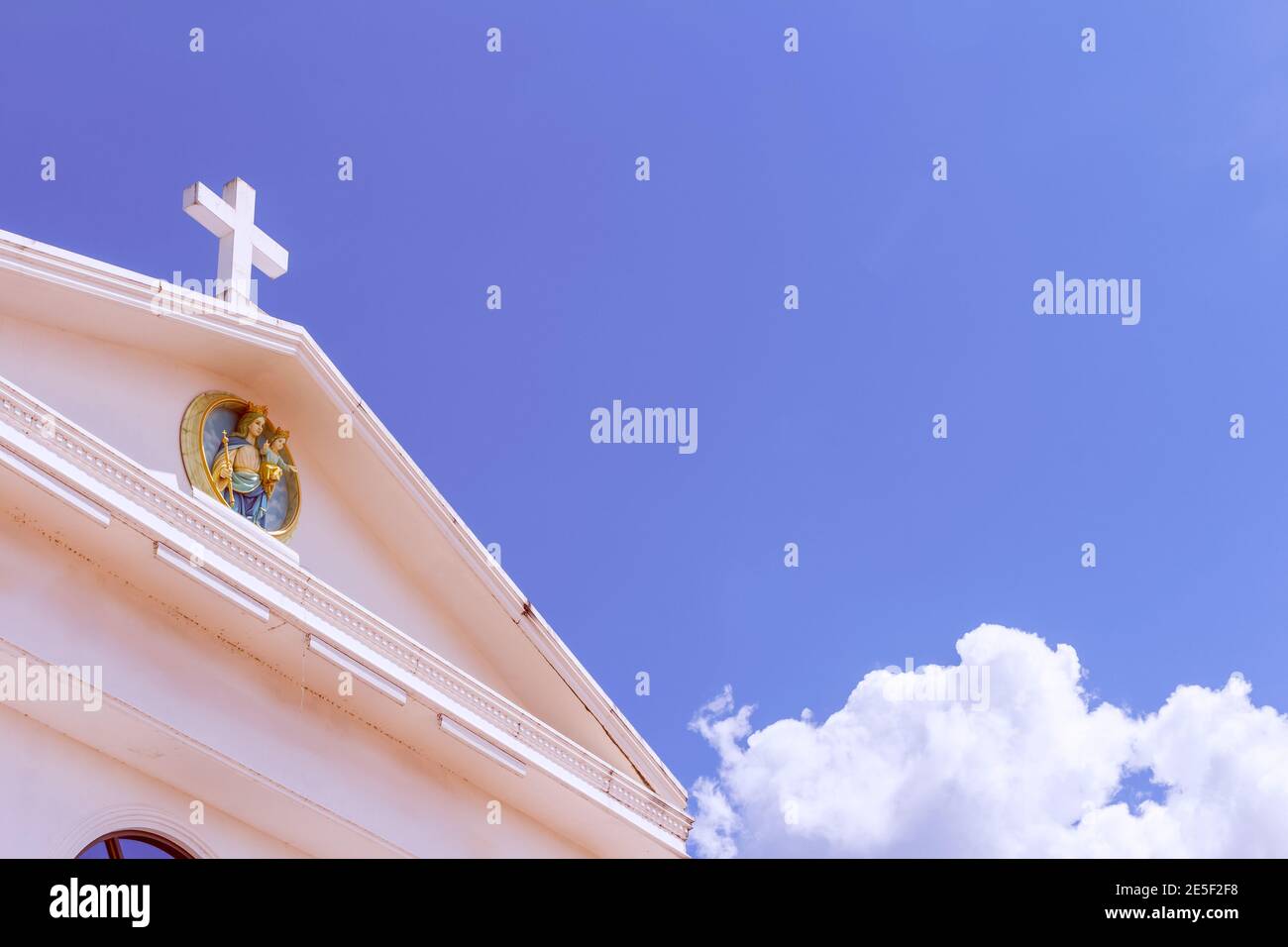 big white cross on blue sky Stock Photo - Alamy