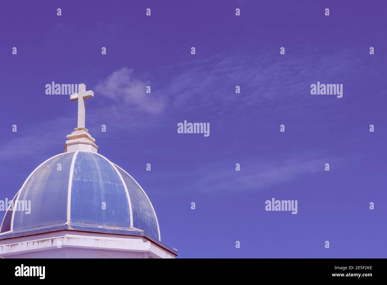 big white cross on blue sky Stock Photo - Alamy