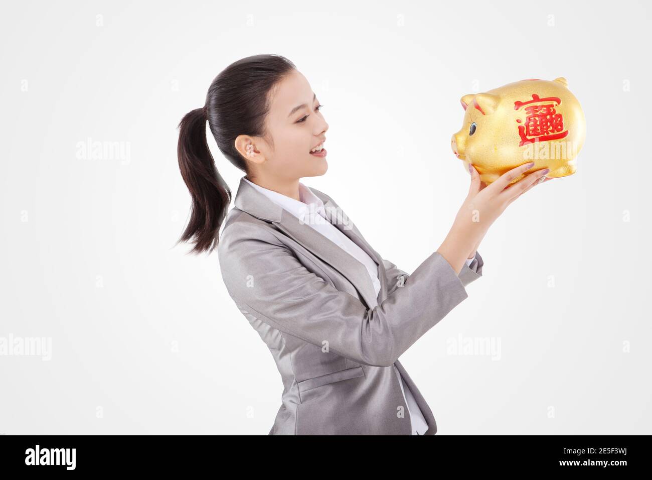 Oriental business woman and piggy bank high quality photo Stock Photo ...