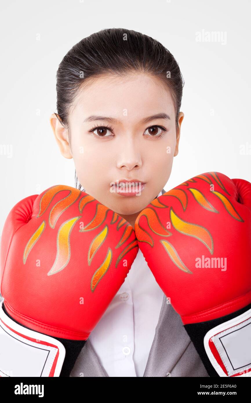 Indian woman wearing boxing gloves hi-res stock photography and images - Alamy