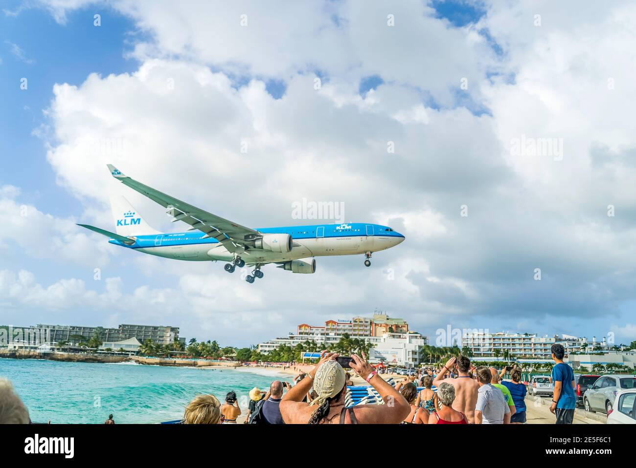 Airplane landing on the airport in the Caribbean island of St.Maarten ...