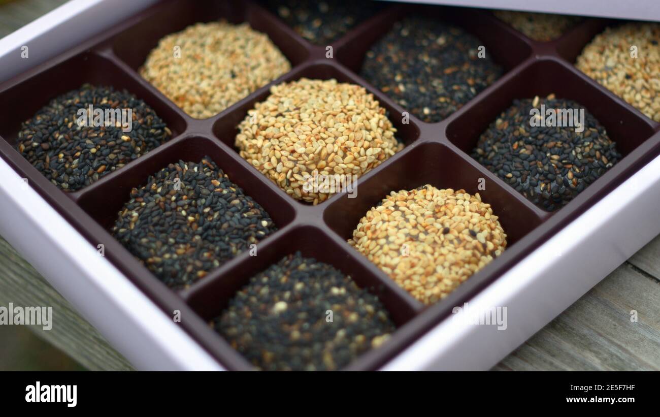 Closeup of traditional rice cake sweets. Japanese Mochi Sesame variant ...