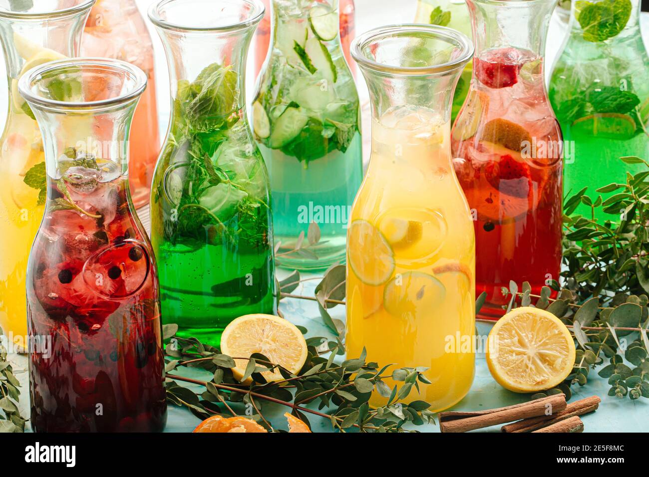 Side view on assorted fresh fruit lemonades Stock Photo - Alamy