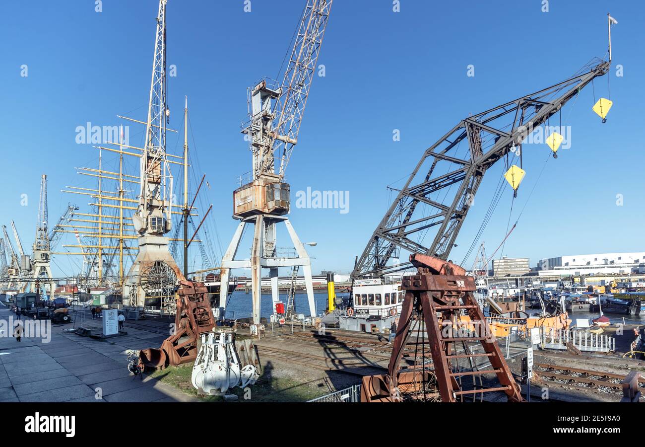 Hamburg, Germany. 25th Dec, 2020. Historic harbour cranes and the four ...