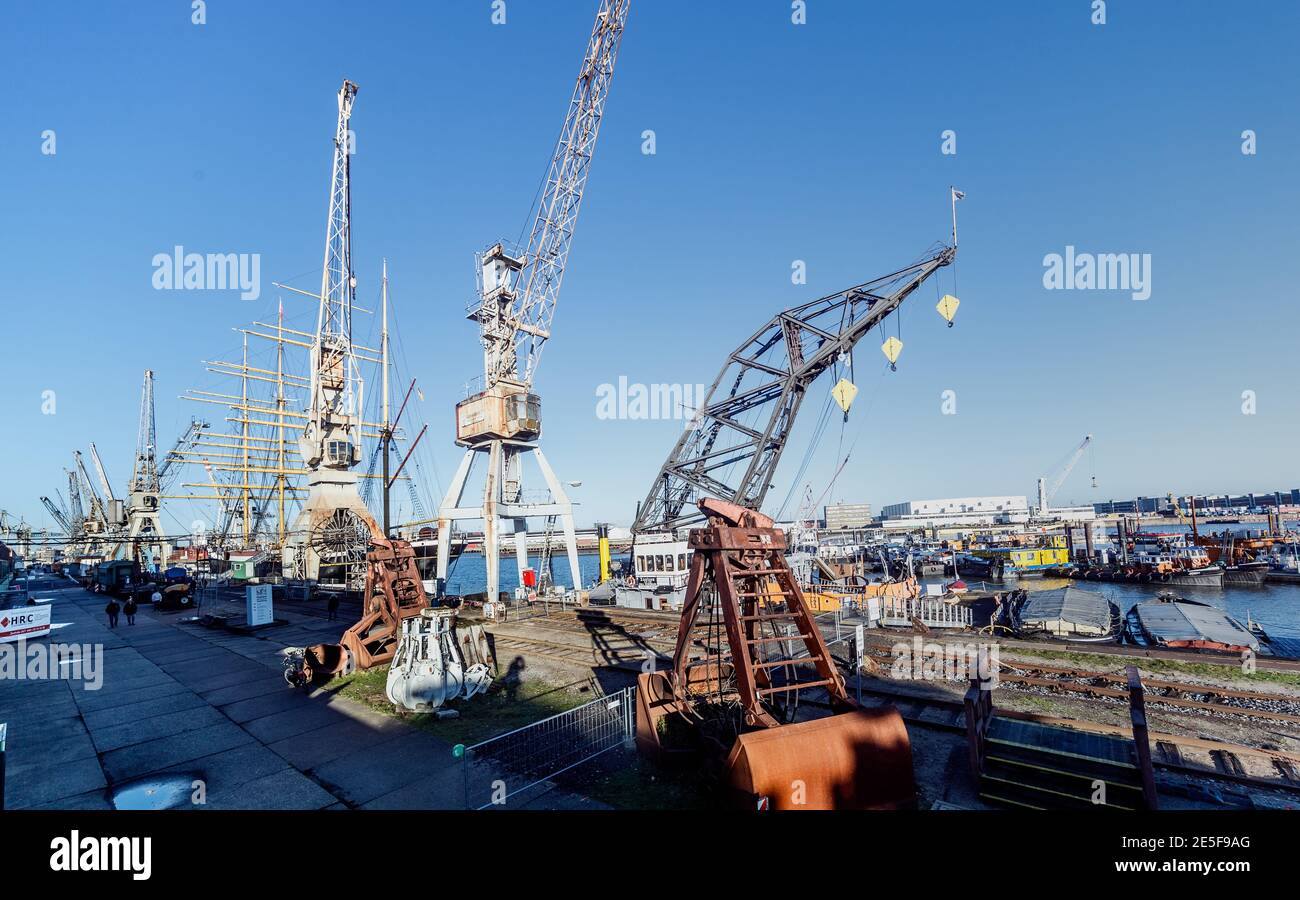 Hamburg, Germany. 25th Dec, 2020. Historic harbour cranes and the four ...