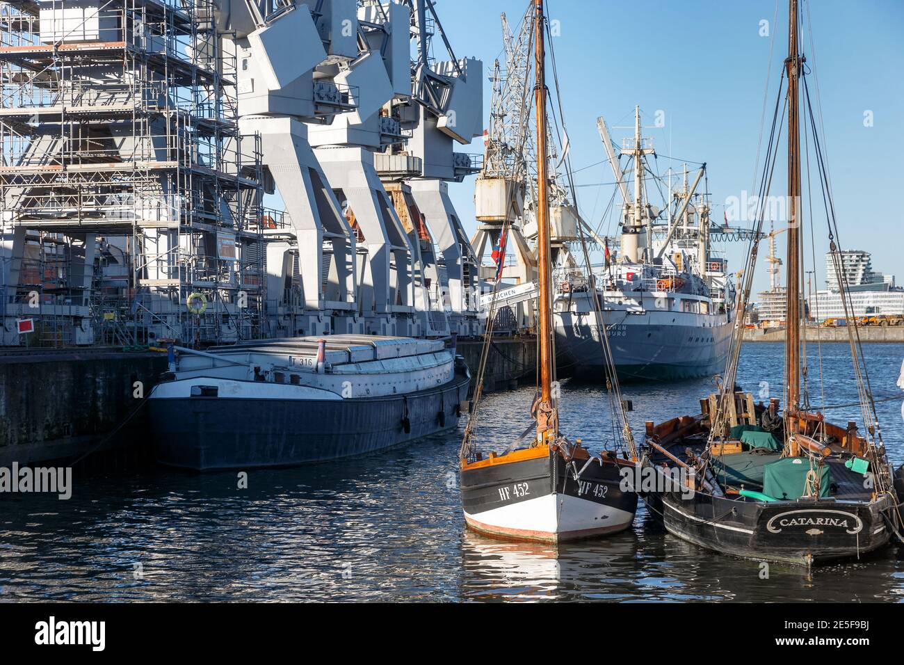 Hamburg, Germany. 25th Dec, 2020. Historic sailing ships, a harbour ...