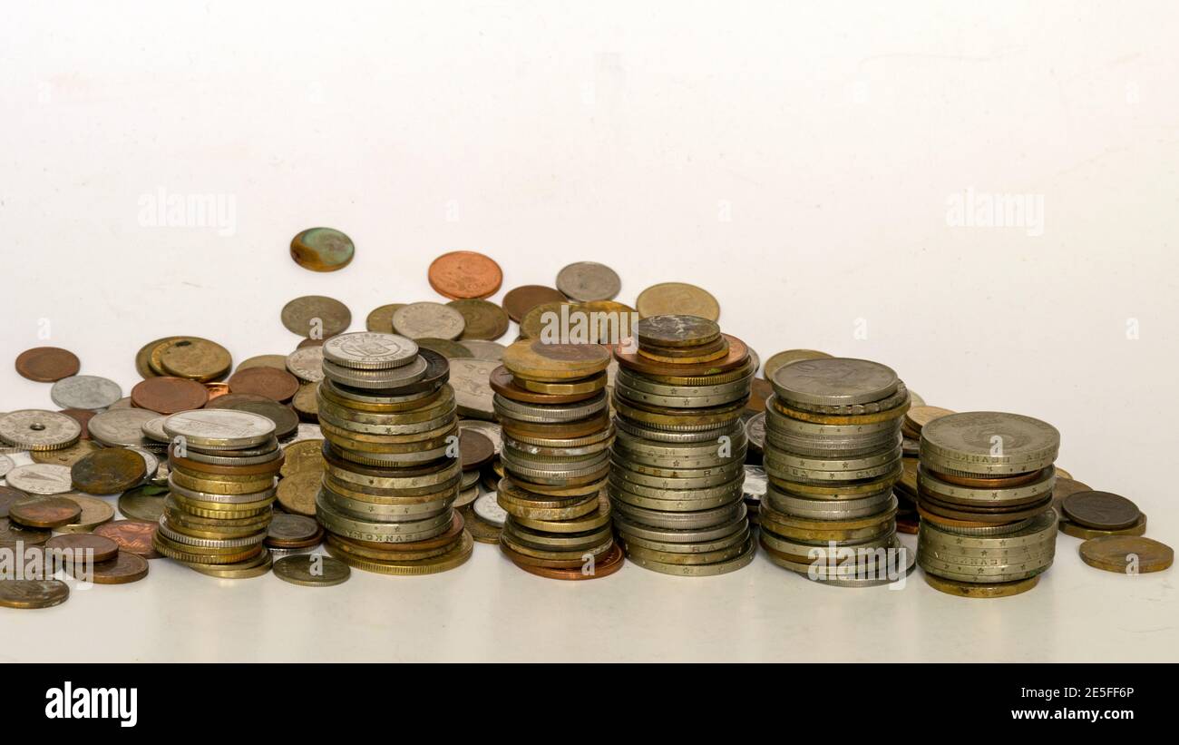 photography with metal coins of different shapes, countries and values ...