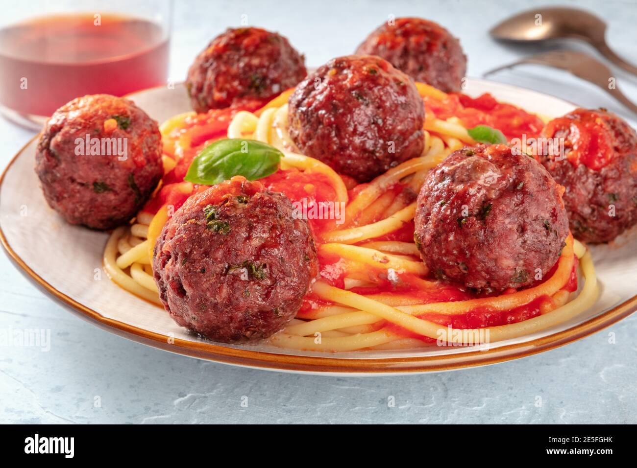 Meatballs with pasta and tomato sauce, a close-up Stock Photo - Alamy