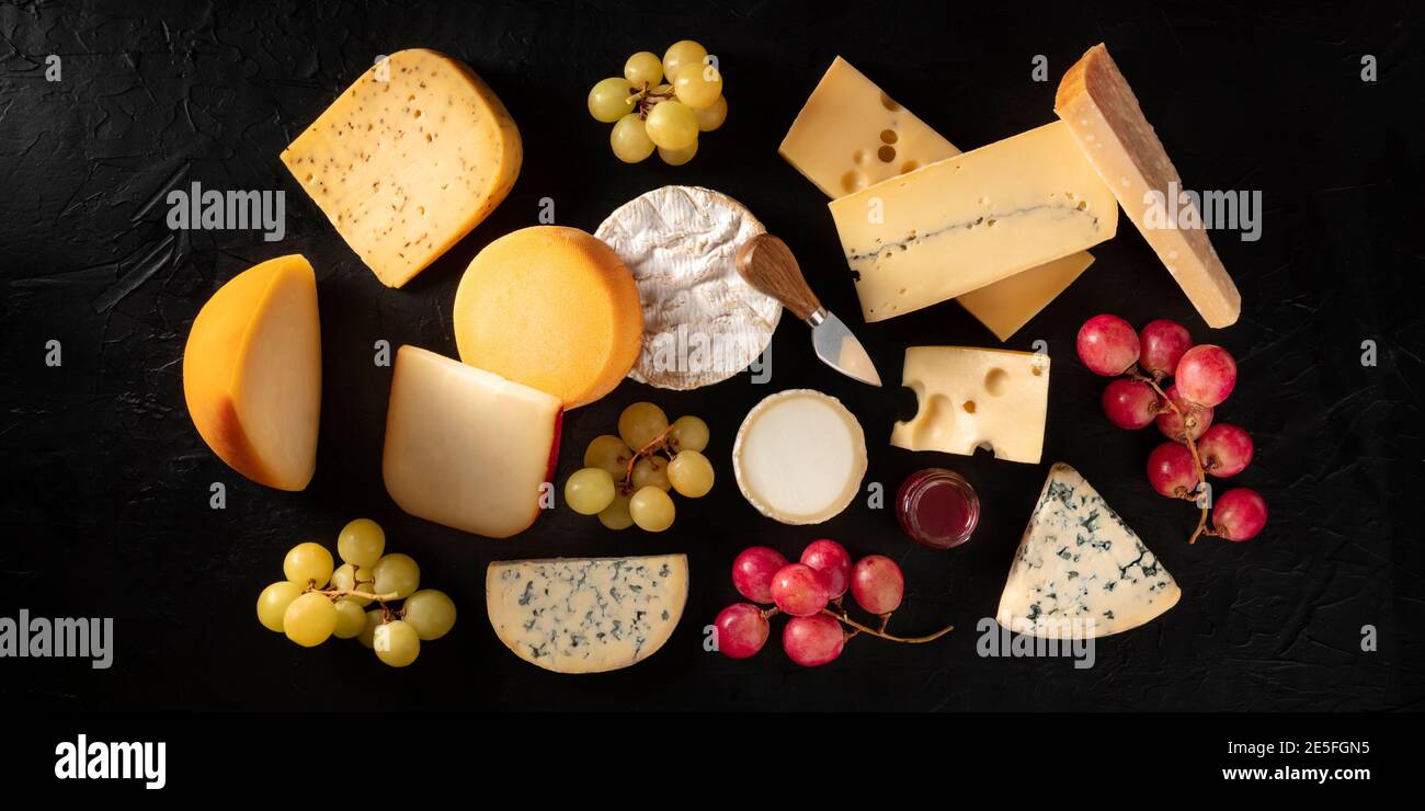 Cheese panorama, many different types of cheeses, shot from the top on ...