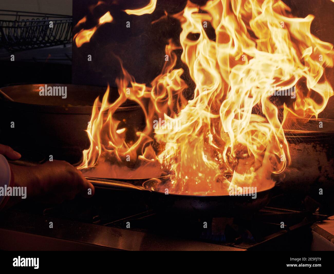 Chef restaurant kitchen flame hi-res stock photography and images - Alamy