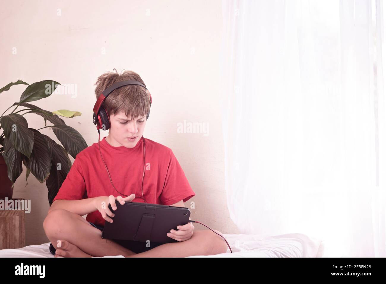 school going child learning online with divices Stock Photo - Alamy