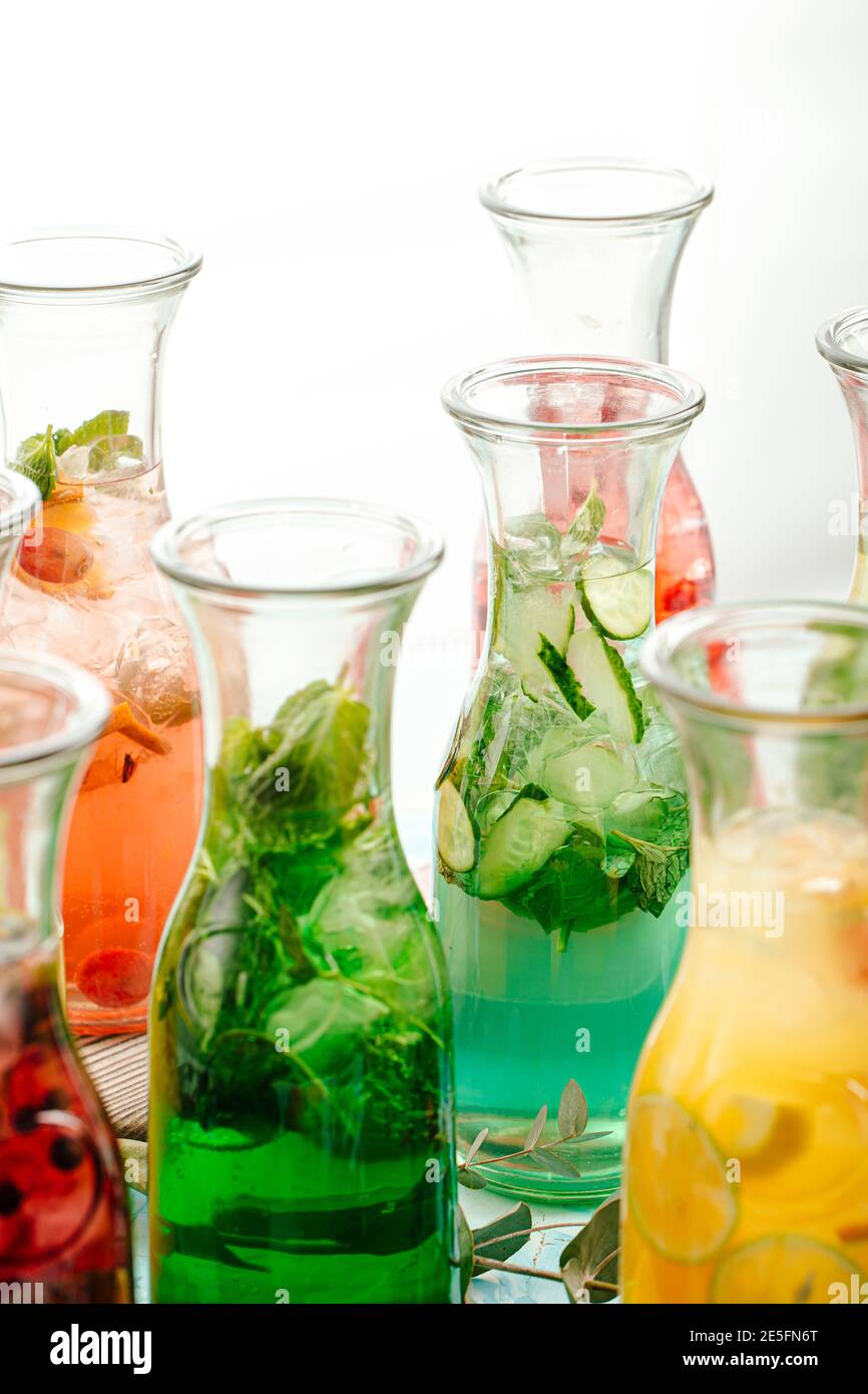 Side view on assorted fresh fruit lemonades Stock Photo - Alamy