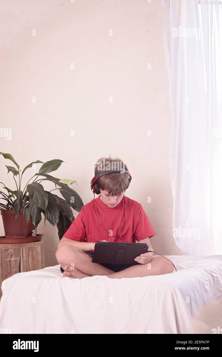 school going child learning online with divices Stock Photo - Alamy