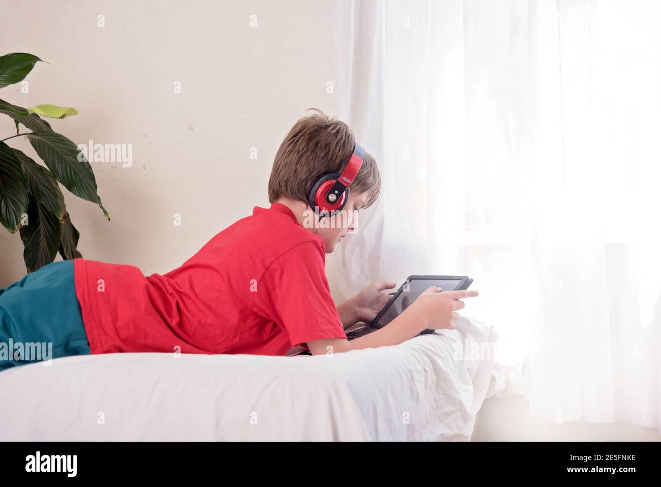 school going child learning online with divices Stock Photo - Alamy