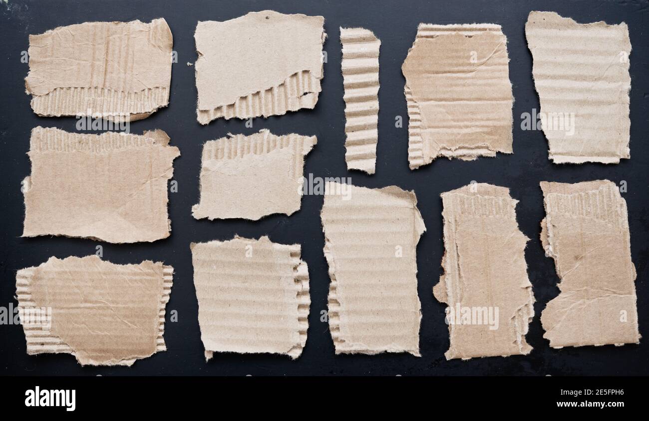 Cardboard scraps isoalted on white background Stock Photo - Alamy