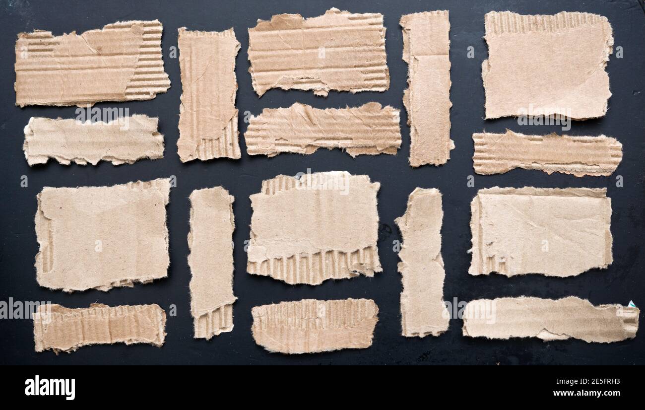 Cardboard scraps isoalted on white background Stock Photo - Alamy