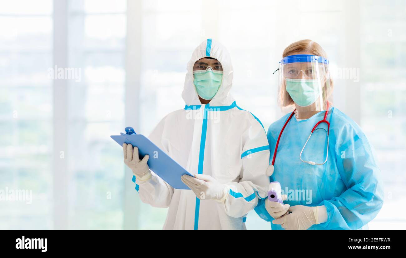 International doctor team. Hospital medical staff in hazmat suit, face ...