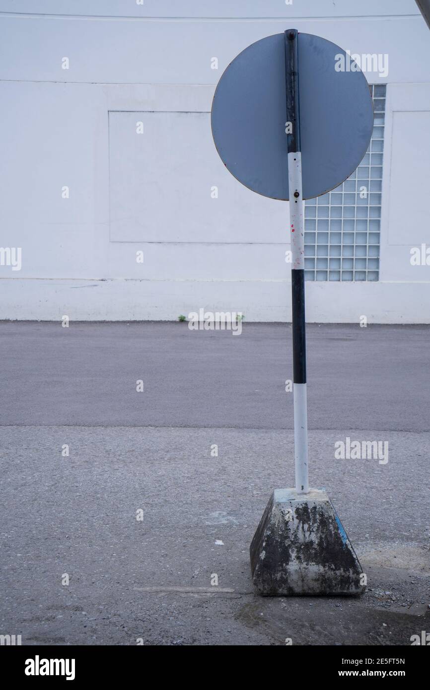 The back of Traffic Signs white wall background Stock Photo - Alamy