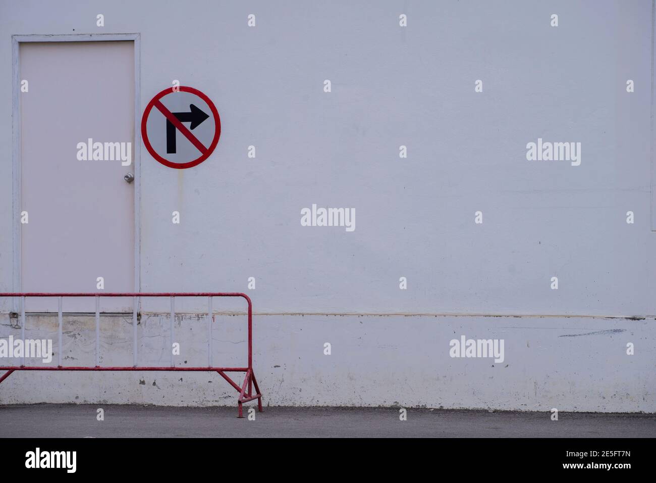Don't turn right Traffic Signs on white wall background Stock Photo - Alamy