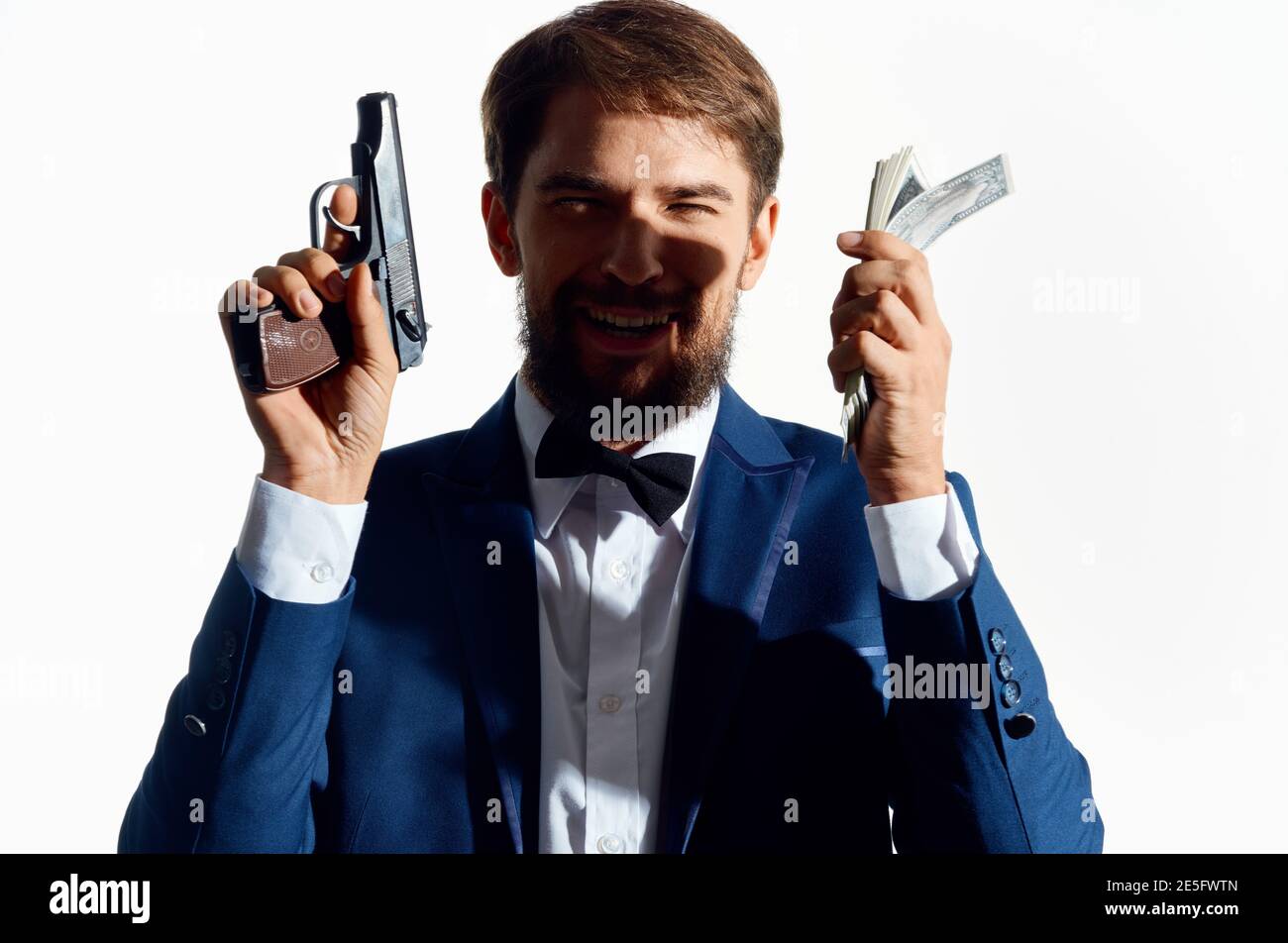 man in suit gun money gangster business light background Stock Photo ...