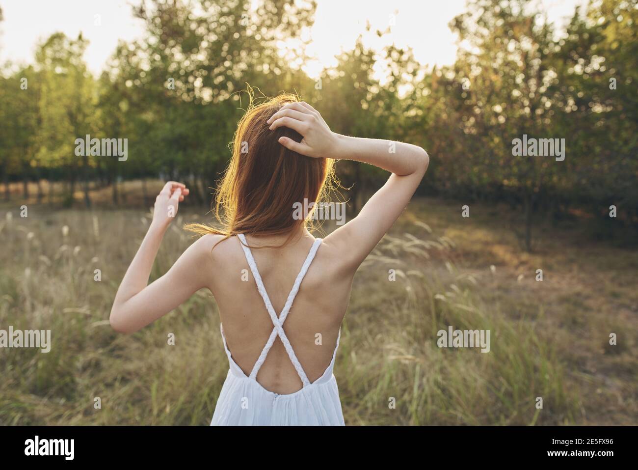 White sundress from behind hi-res stock photography and images - Alamy