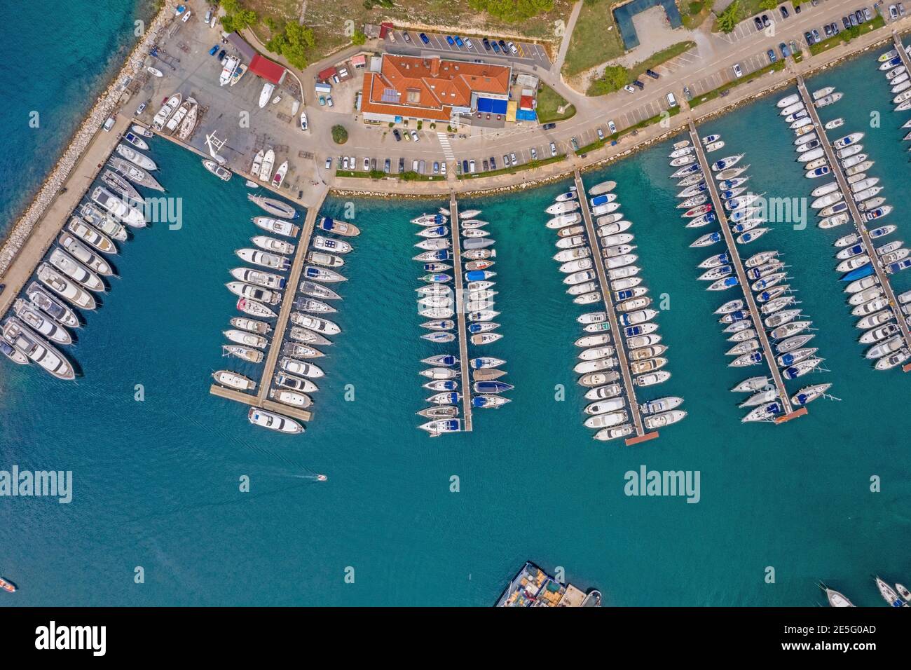 Top view on Vrsar harbour with plenty of ships during daytime with ...