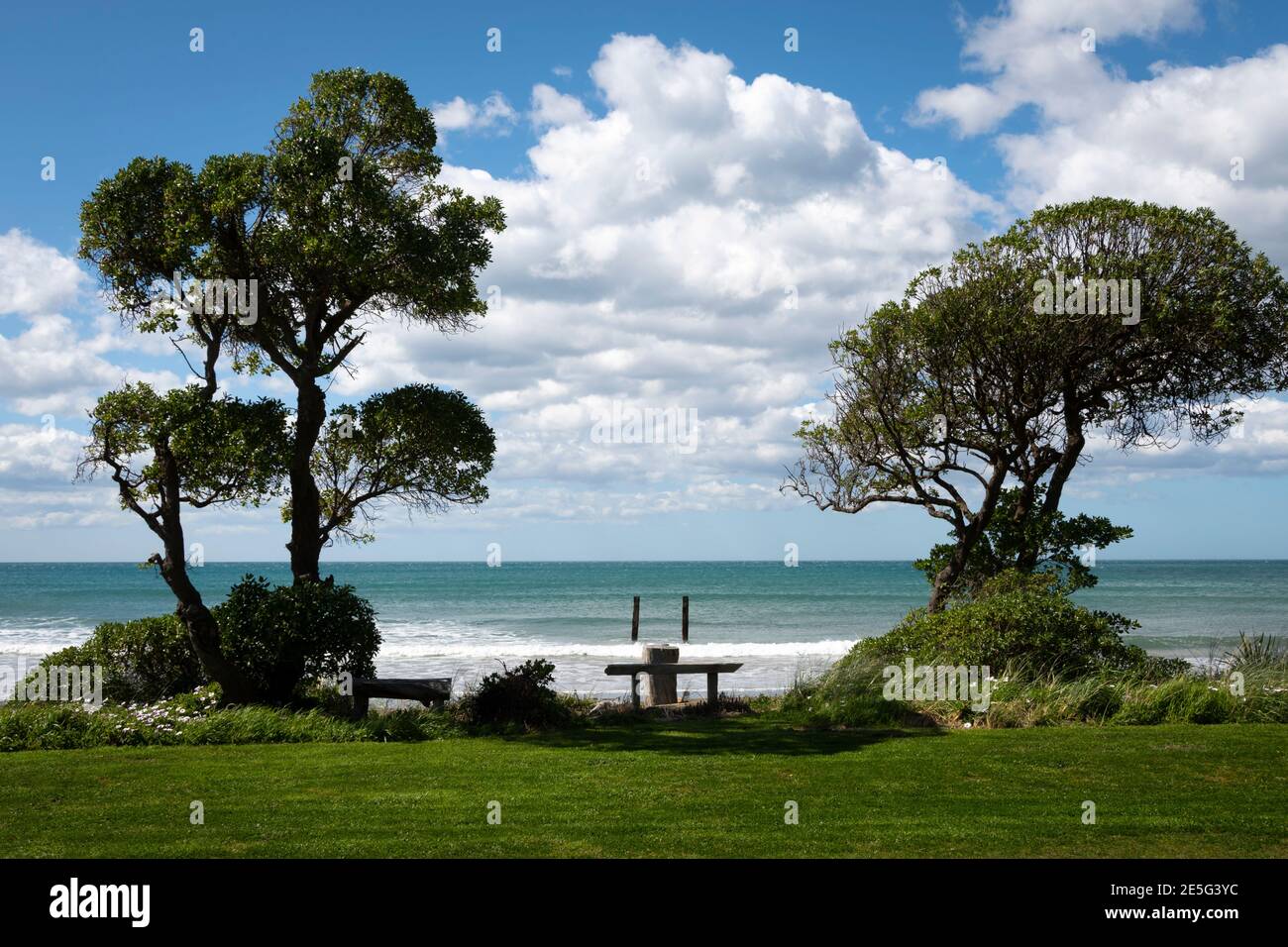 Remains of old wharf on beach at Akitio, Tararua District, North Island ...
