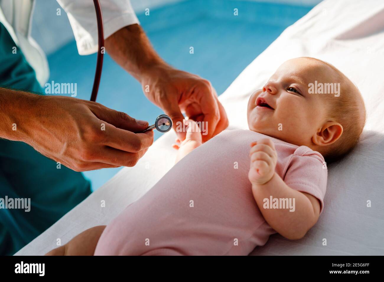 Pediatrician doctor examines baby. Healthcare, people, examination ...