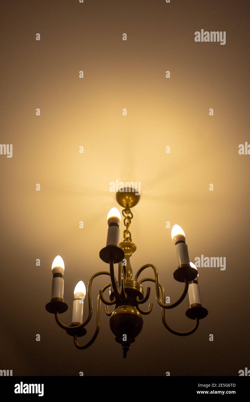 Old lamp with LED bulbs on white ceiling Stock Photo - Alamy