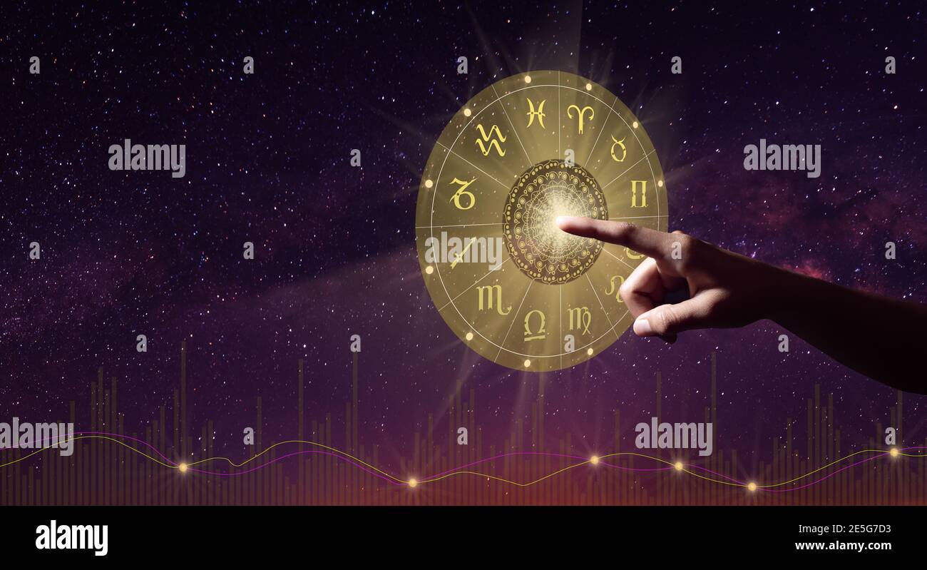 Human predicts the future. Zodiac sign wheel of fortune hologram with ...