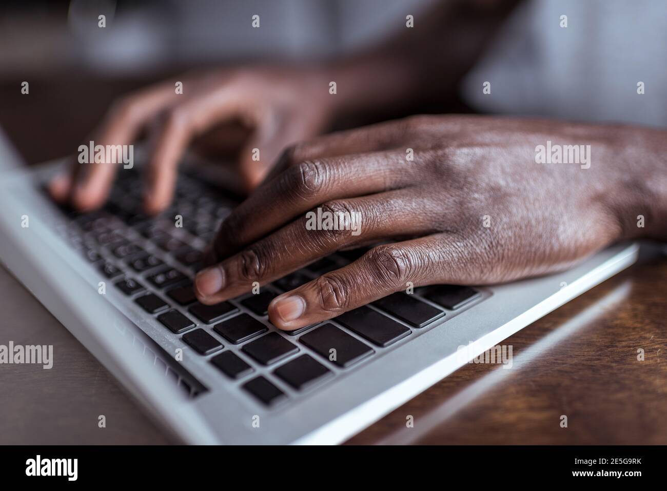 African american man typing hi-res stock photography and images - Alamy