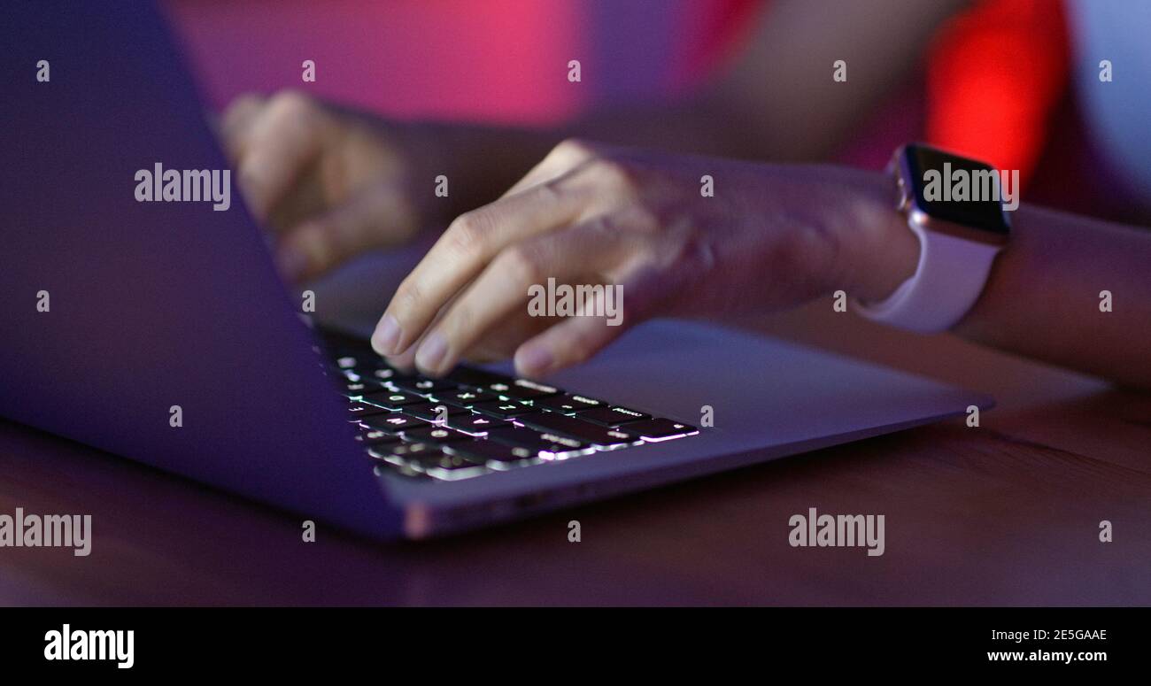Type on laptop computer Stock Photo - Alamy