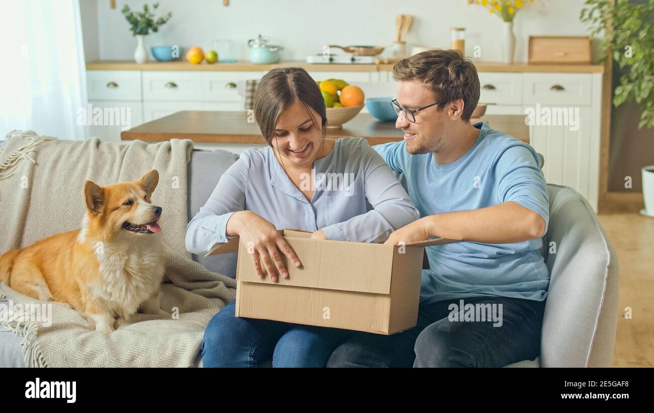 The Family Satisfied By a Quick Delivery. Unpacking of Order From ...